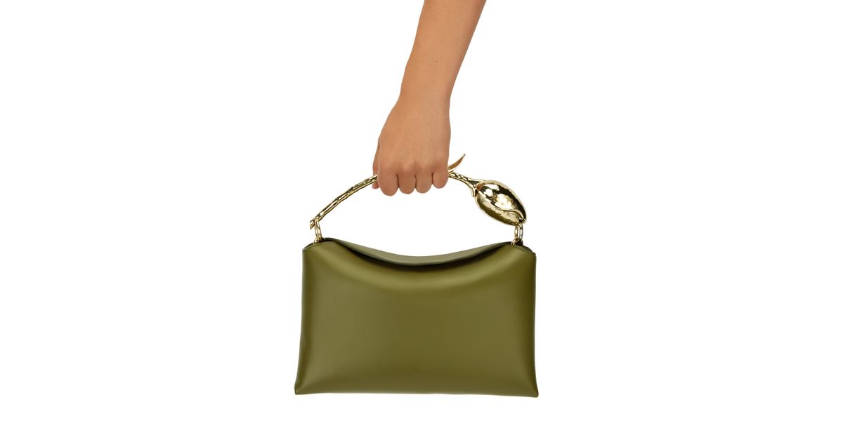 The article: Erdem Introduces Its Debut Leather Goods Collection With ...